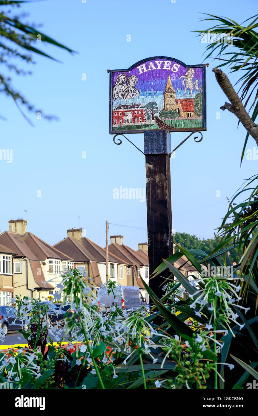 Historical old town sign in Hayes, Kent surrounded by trees. Sign ...