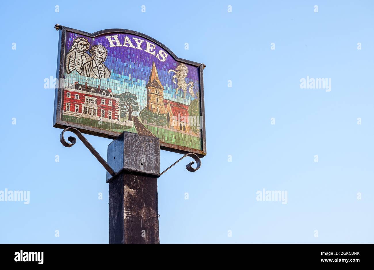Historical old town sign in Hayes, Kent against a clear blue sky. Sign ...