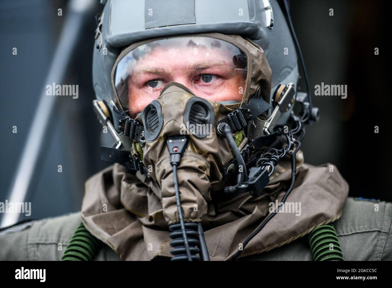 Capt. Conner Muilenburg, 535th Airlift Squadron pilot, exits a C-17 ...