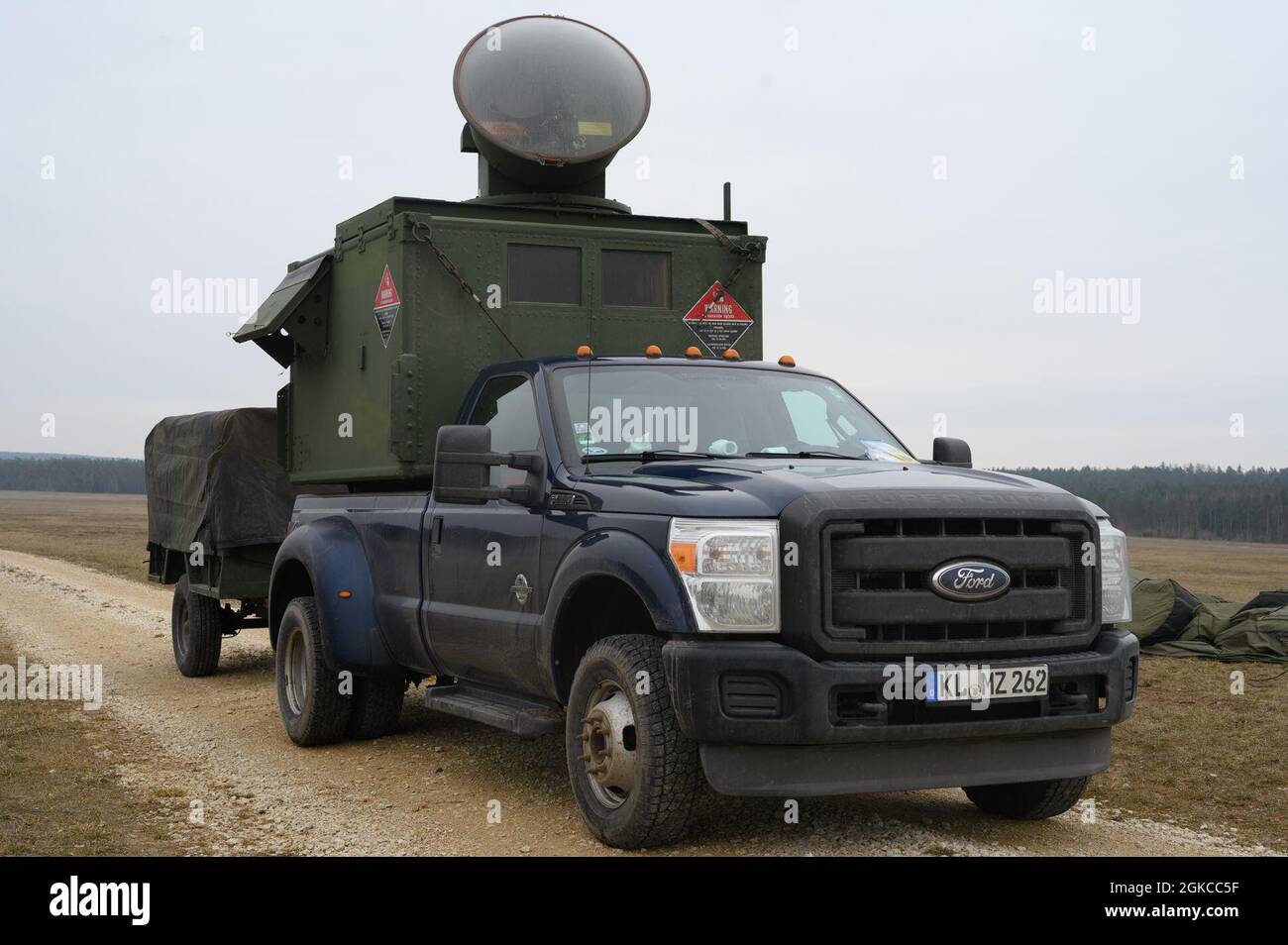 A surface-to-air-threat emitter sits on a government vehicle during ...