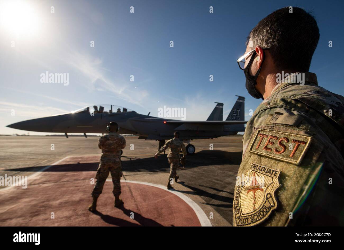 Brig. Gen. Scott Cain, 96th Test Wing commander, watches as maintainers ...