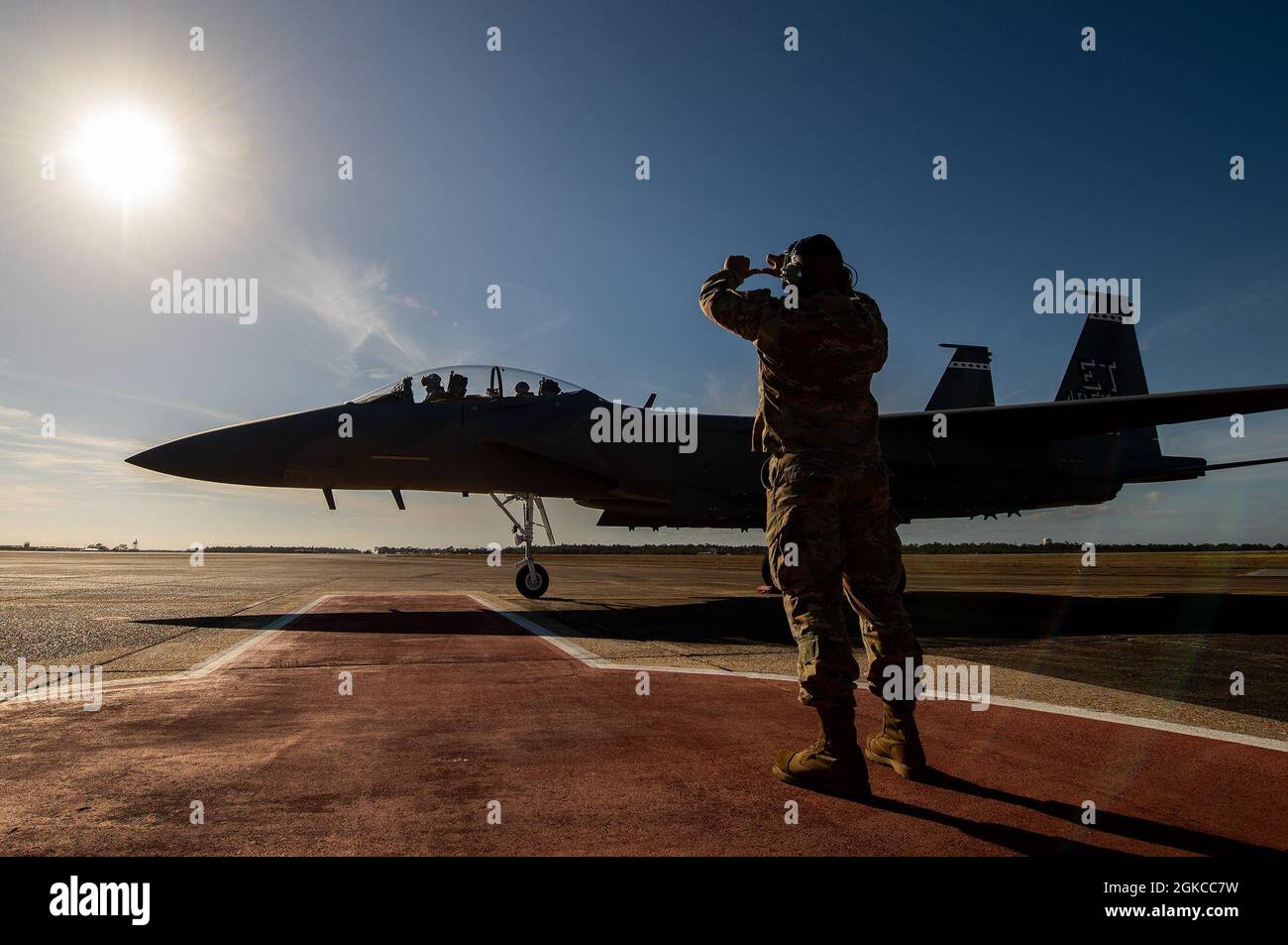 Staff Sgt. Joshua Whitford, 96th Maintenance Group, marshals the F-15EX ...