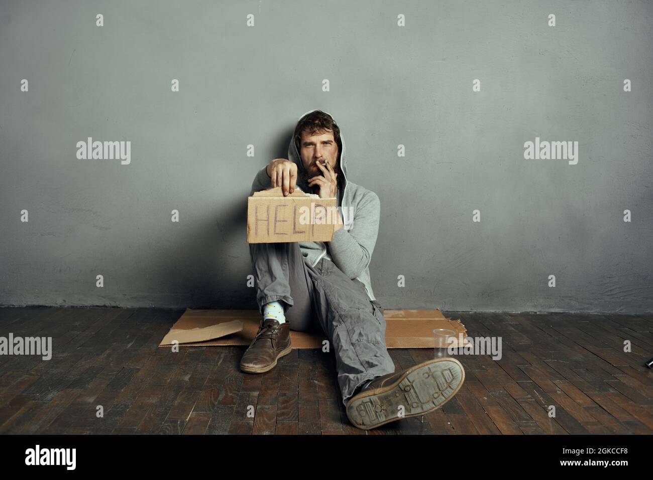 Sad bearded white man sits hi-res stock photography and images - Alamy