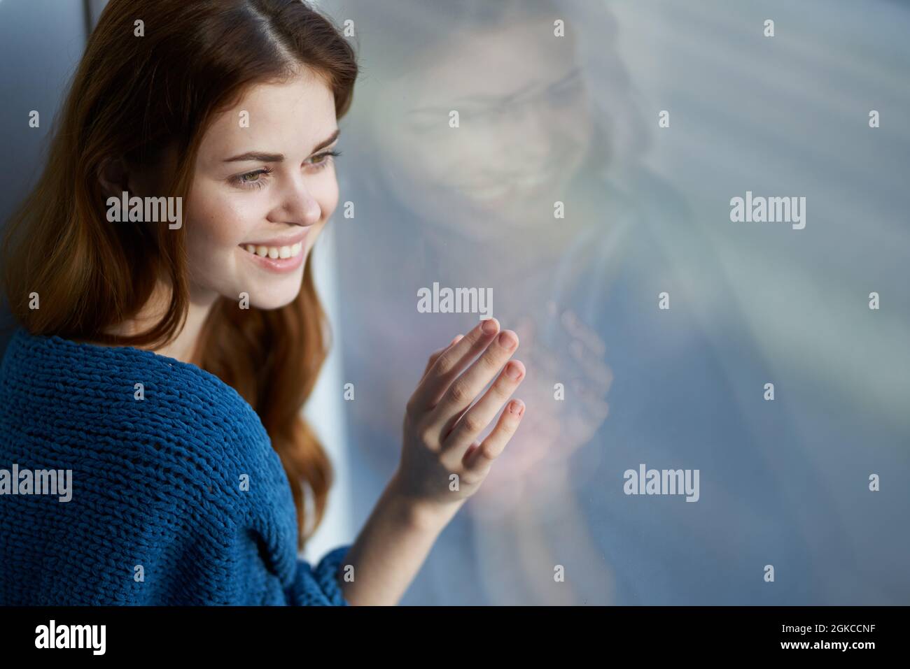 woman attractive look with a blue plaid dreamy look Stock Photo - Alamy