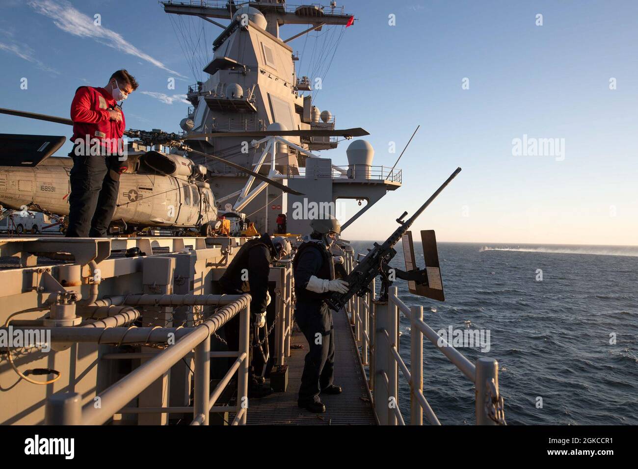 Gunner's Mate 2nd Class Brandon Decker, from Dallas, assigned to USS ...