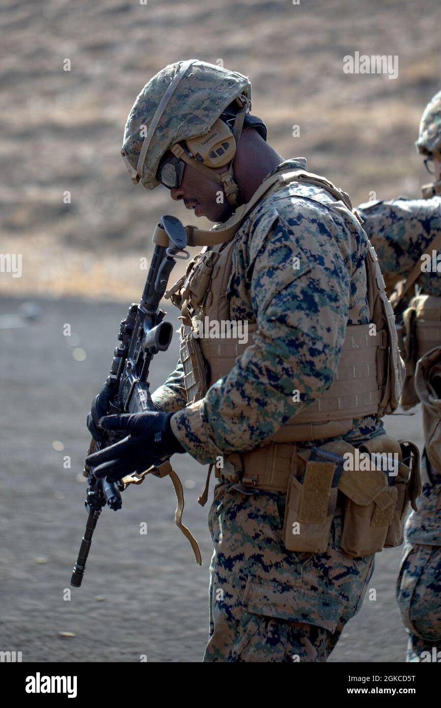 U.S. Marine Corps Cpl. Napoleon Dunbar, a field artillery cannoneer ...