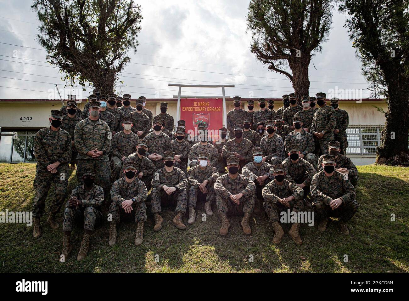 U.S. Marines and Sailors with 3rd Marine Expeditionary Brigade gather ...