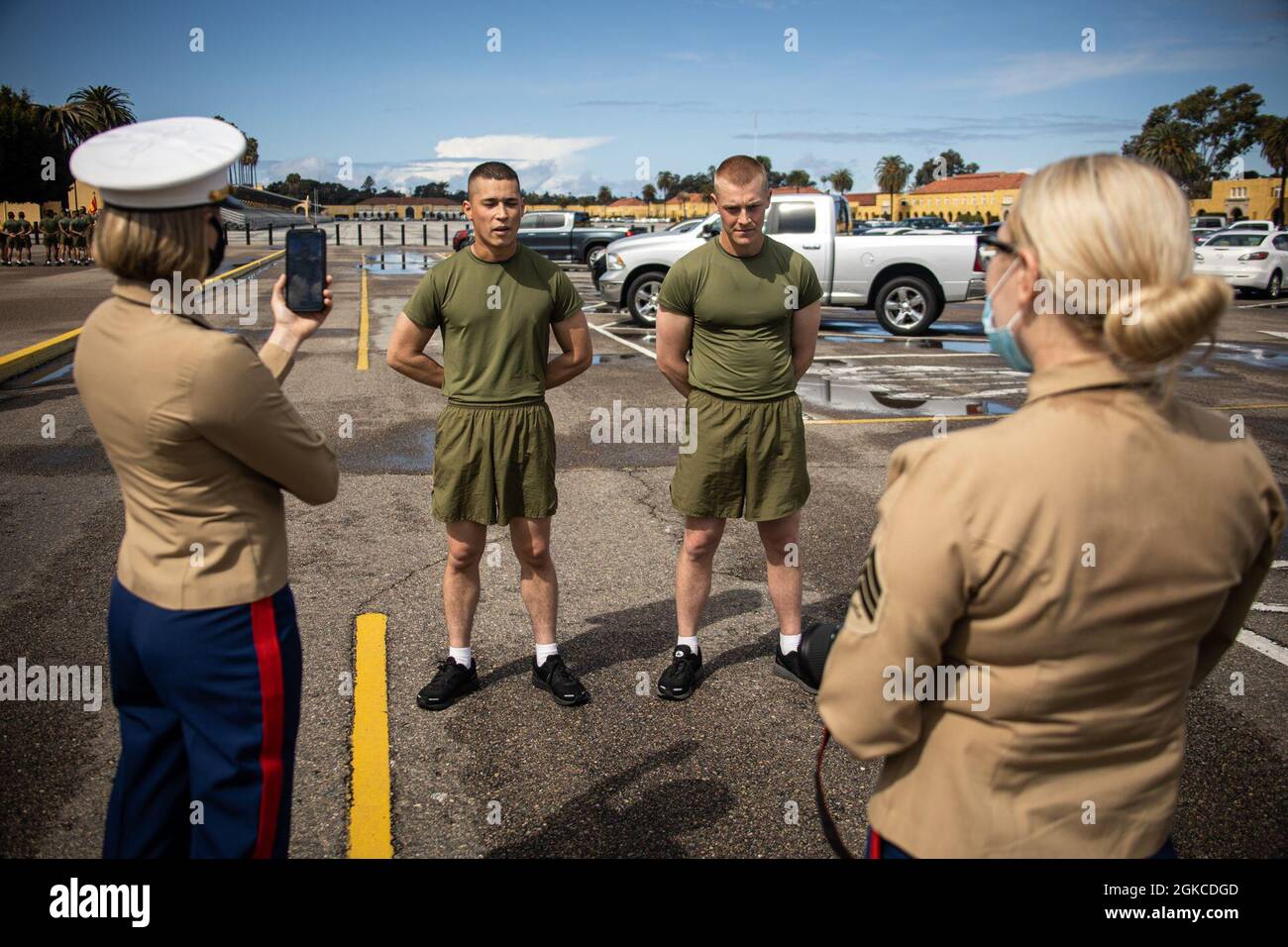 U.S. Marine Corps 1st Lt. Mallory S. VanderSchans (left), the ...