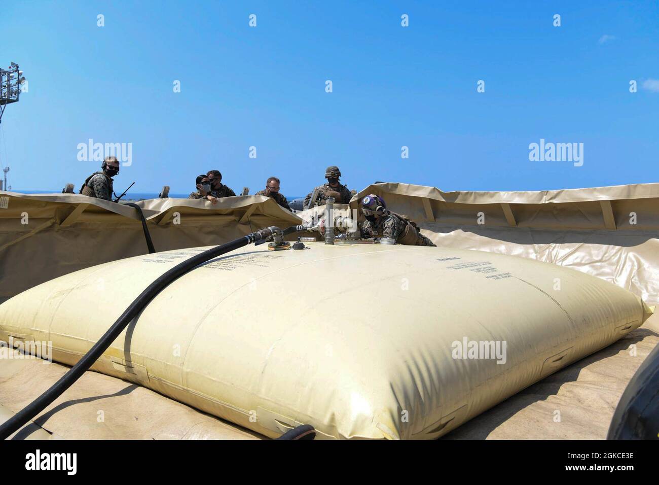 U.S. Marine Cpl. Brenden Breeden, a line safety NCO from Detachment 18 ...
