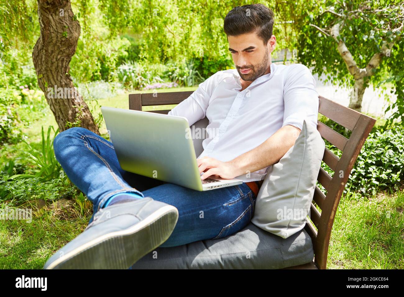 Businessman chatting on laptop hi-res stock photography and images - Alamy