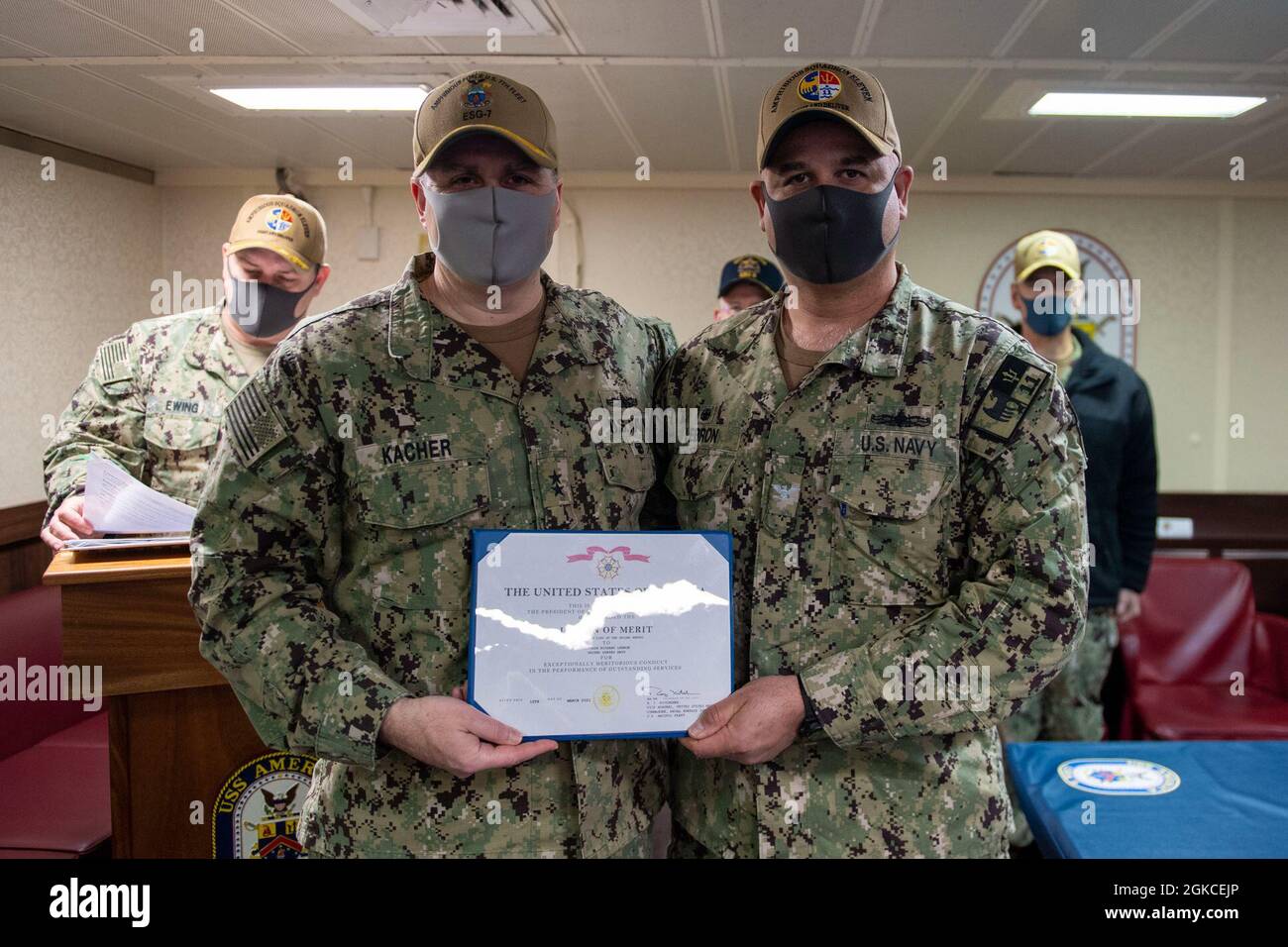 SASEBO, Japan (March 12, 2021) Rear Adm. Fred Kacher, left, commander ...