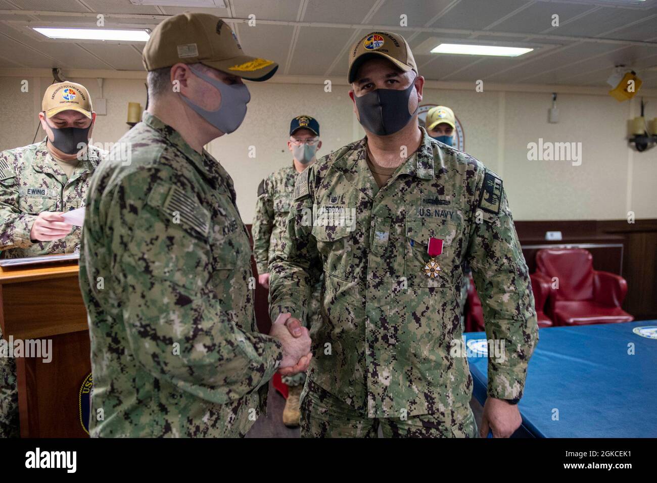 SASEBO, Japan (March 12, 2021) Rear Adm. Fred Kacher, left, commander ...