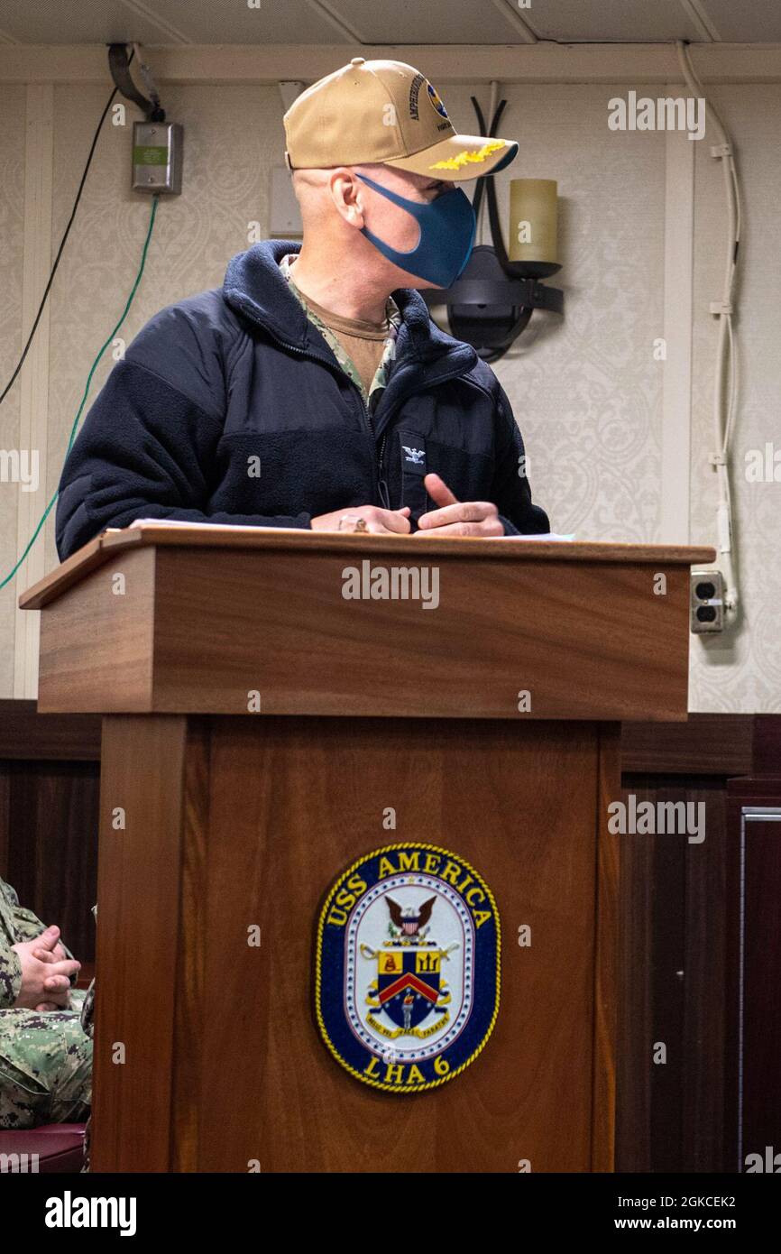 SASEBO, Japan (March 12, 2021) Capt. Greg Baker speaks during a change of command ceremony for ...