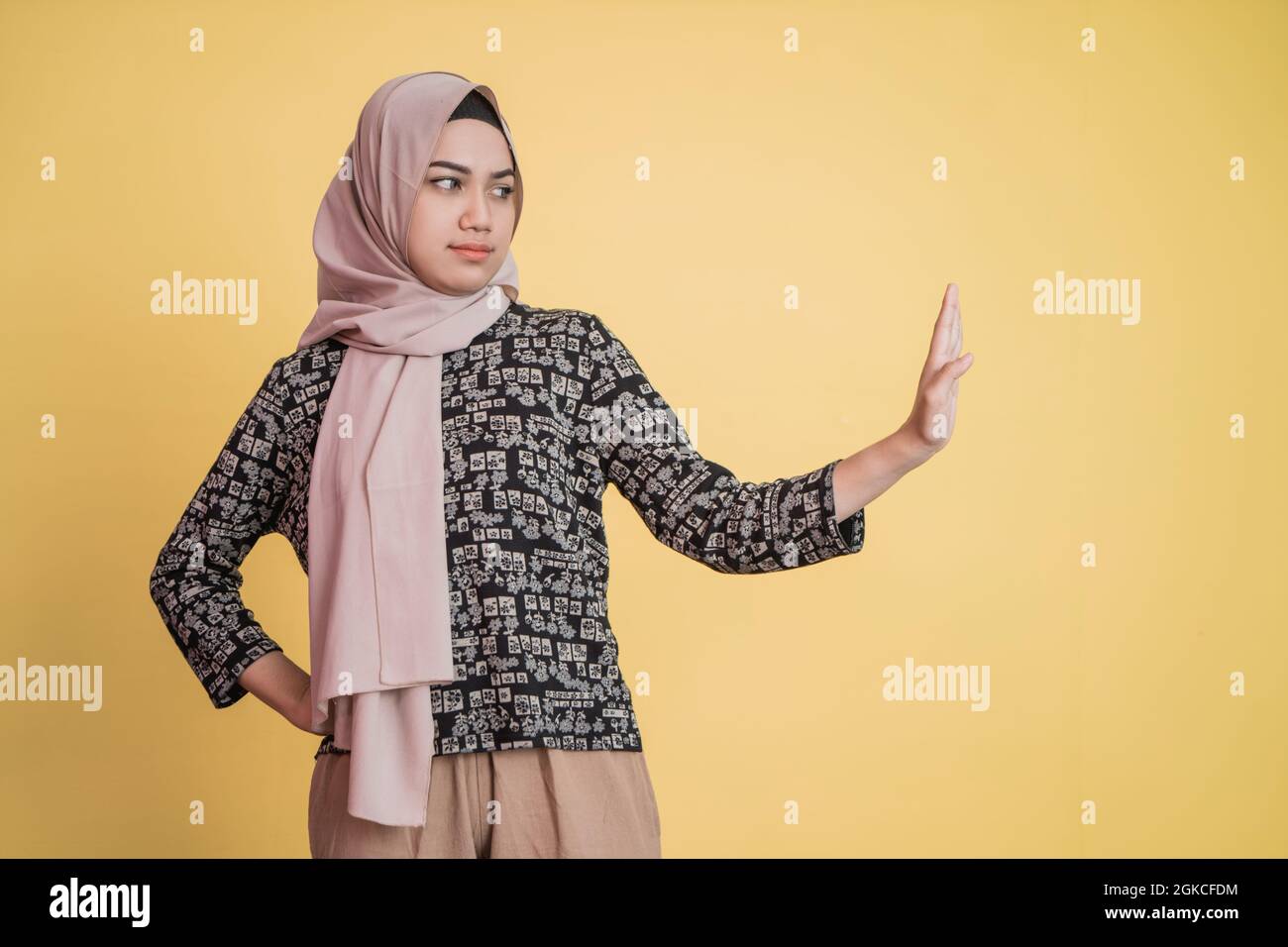 muslim woman wearing hijab with hand gesture pose rejecting offer with ...