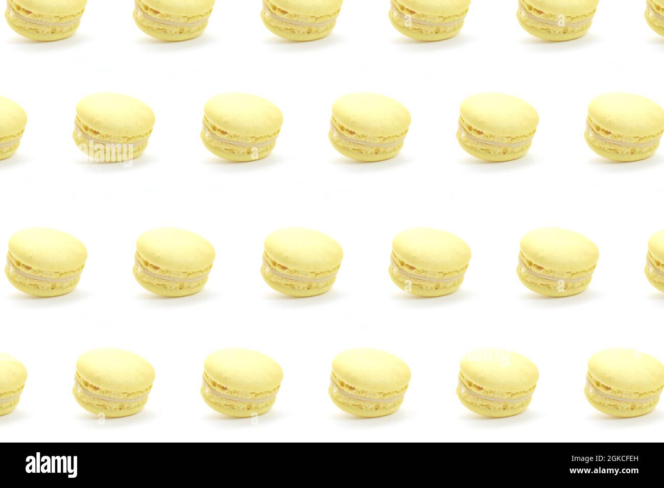 Yellow french macaroons isolated on white background. Nice pattern for ...