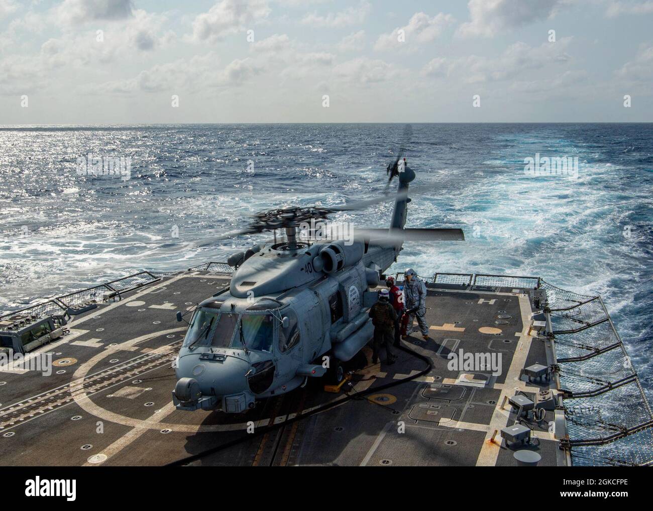 PACIFIC OCEAN (March 12, 2021) U.S. Sailors fuel an MH-60R Sea Hawk ...