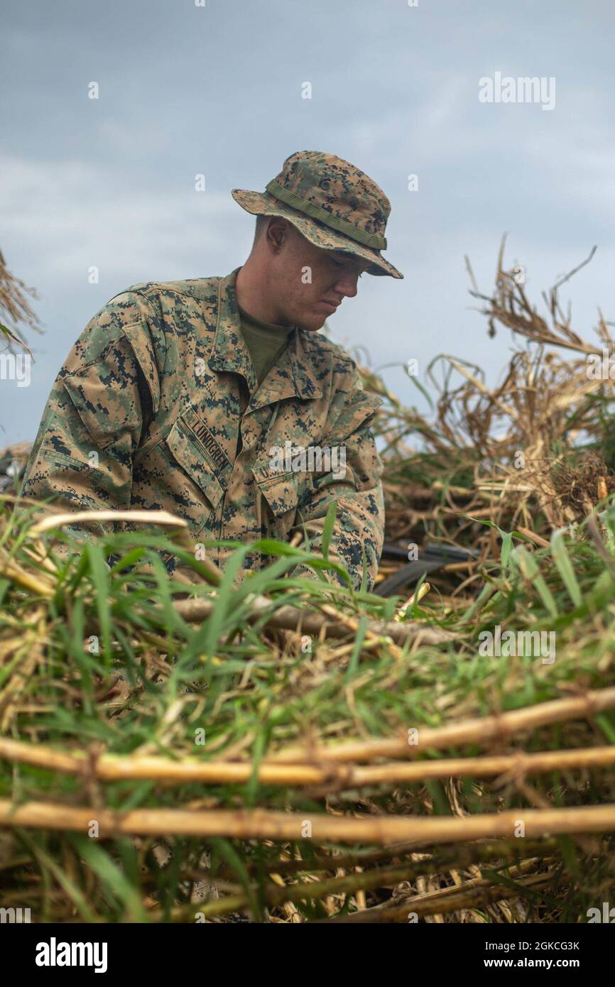 U.S. Marine Corps Lance Cpl. Dustin Lundgren, a rifleman with 3d ...
