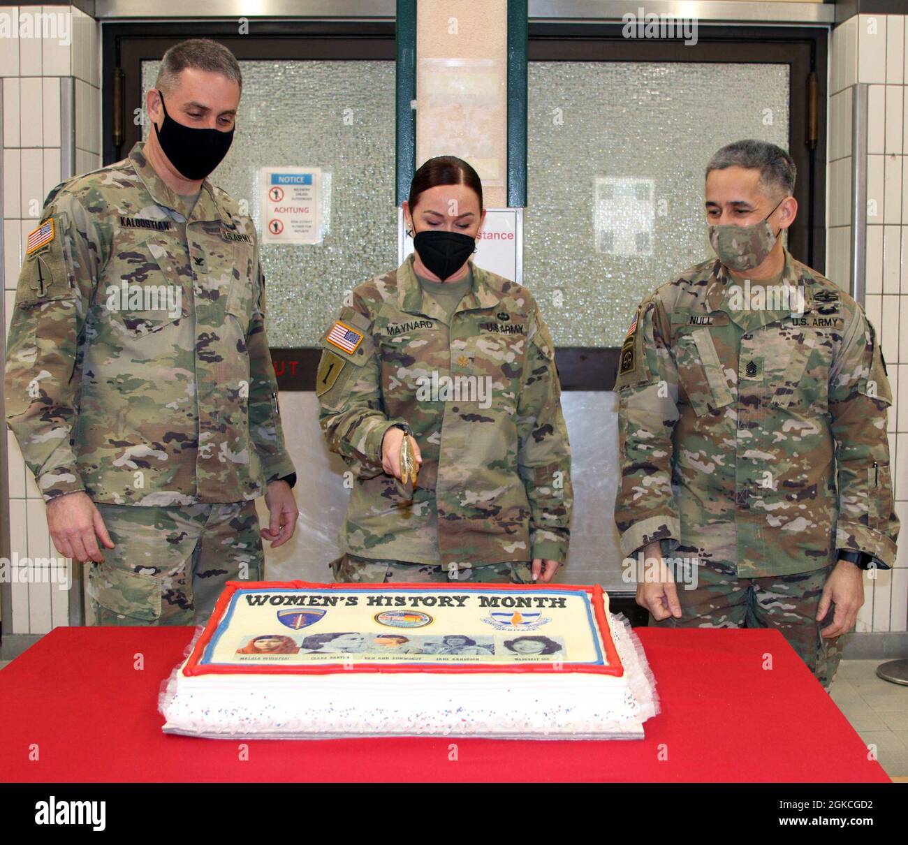Colonel Michael R. Kaloostian, Commander, 2d Theater Signal Brigade, Maj. Victoria Maynard, 102d ...