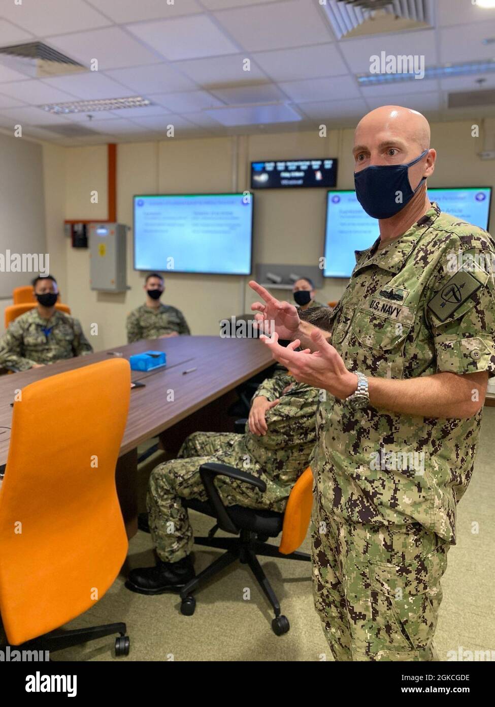 210312-N-PL200-0005 SINGAPORE (March 12, 2021) Capt. Tom Ogden ...