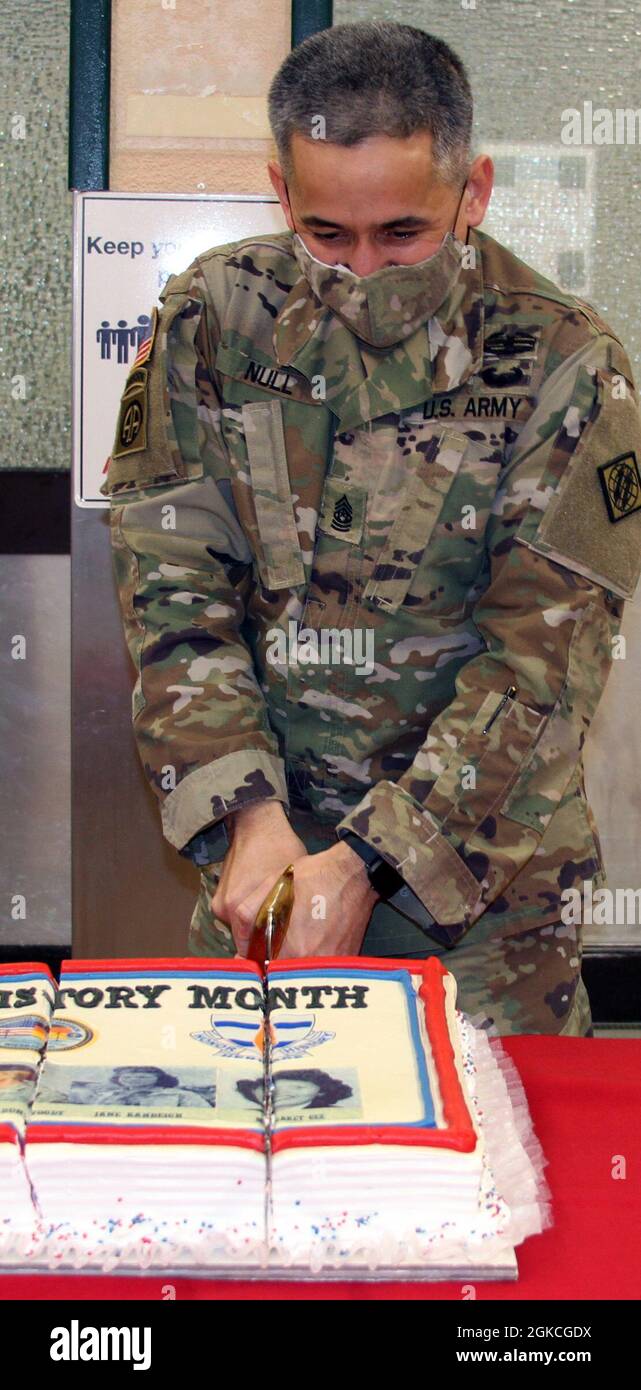 Command Sgt. Maj. Lonnie R. Null, Command Sergeant Major for the 2d Theater Signal Brigade, cut ...