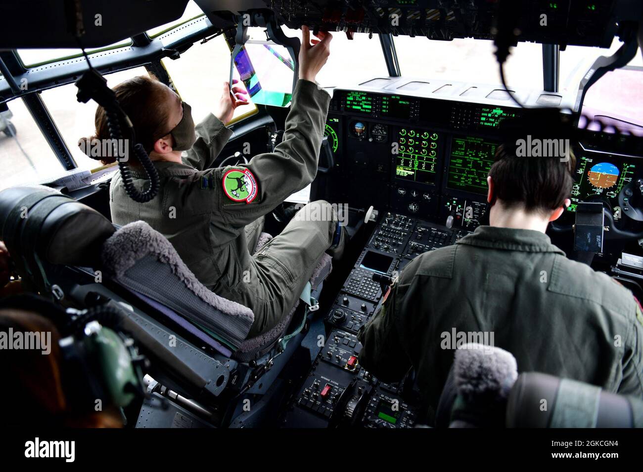 1st Lt. Maddie Atkinson and Maj. Laura Dempster, 41st Airlift Squadron ...