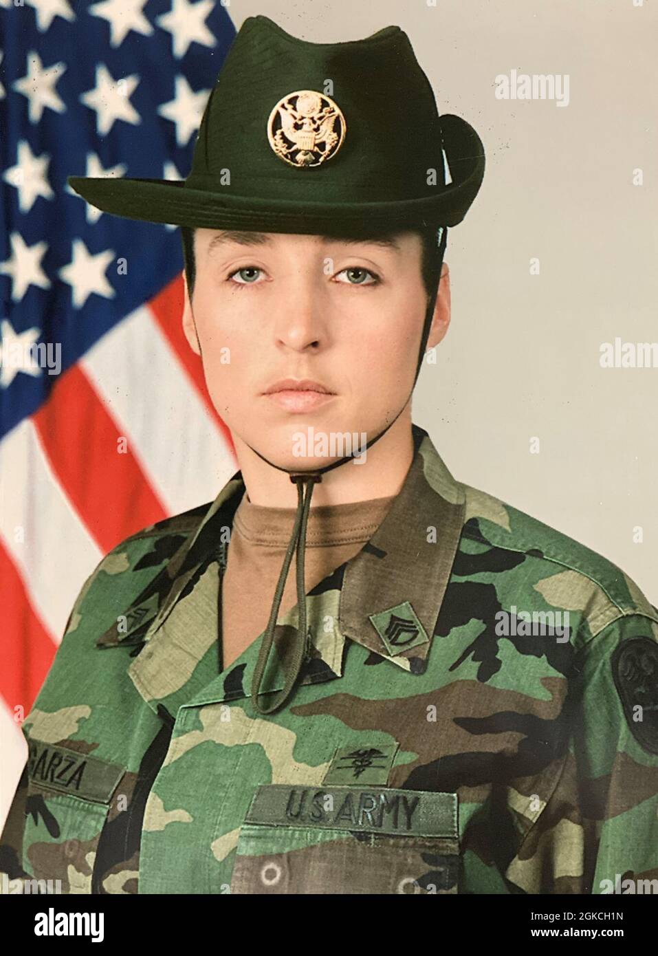 Retired Master Sgt. Corrinn Garza, poses for a portrait in her official ...