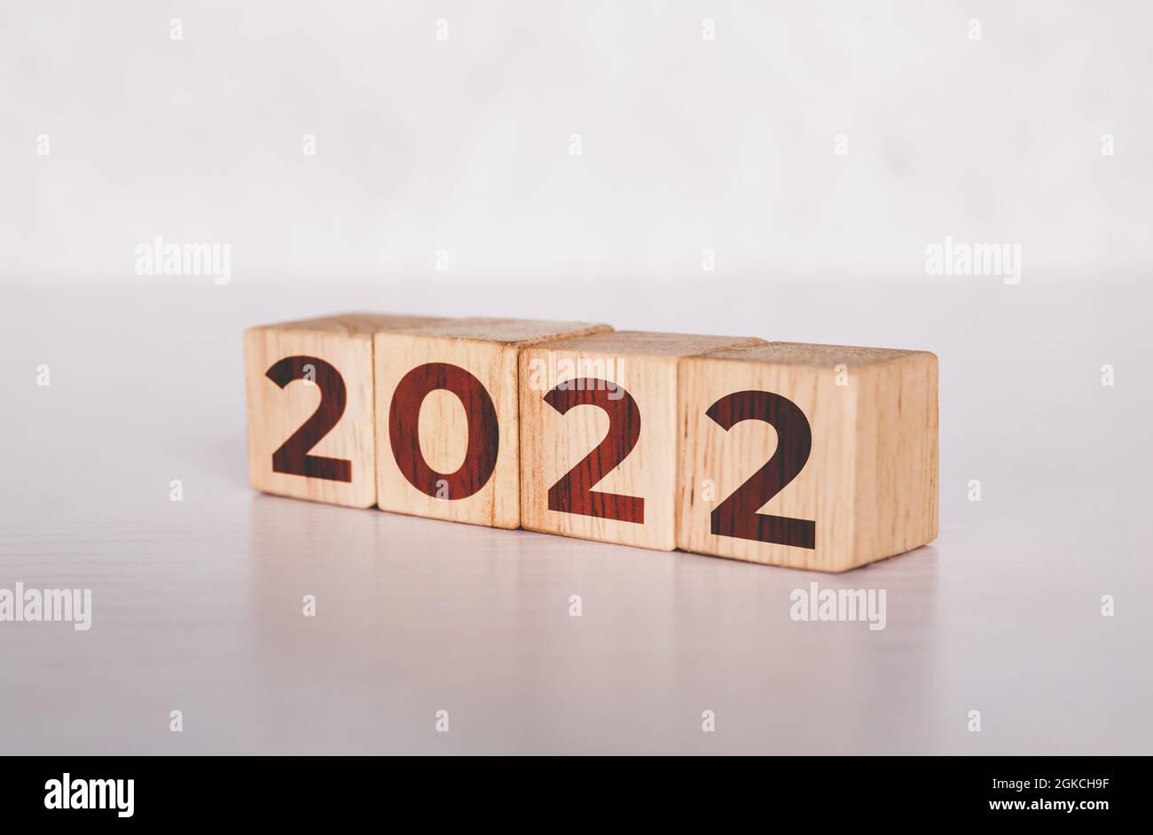 Cube wooden block with text year 2022, beginning and trend, calendar ...