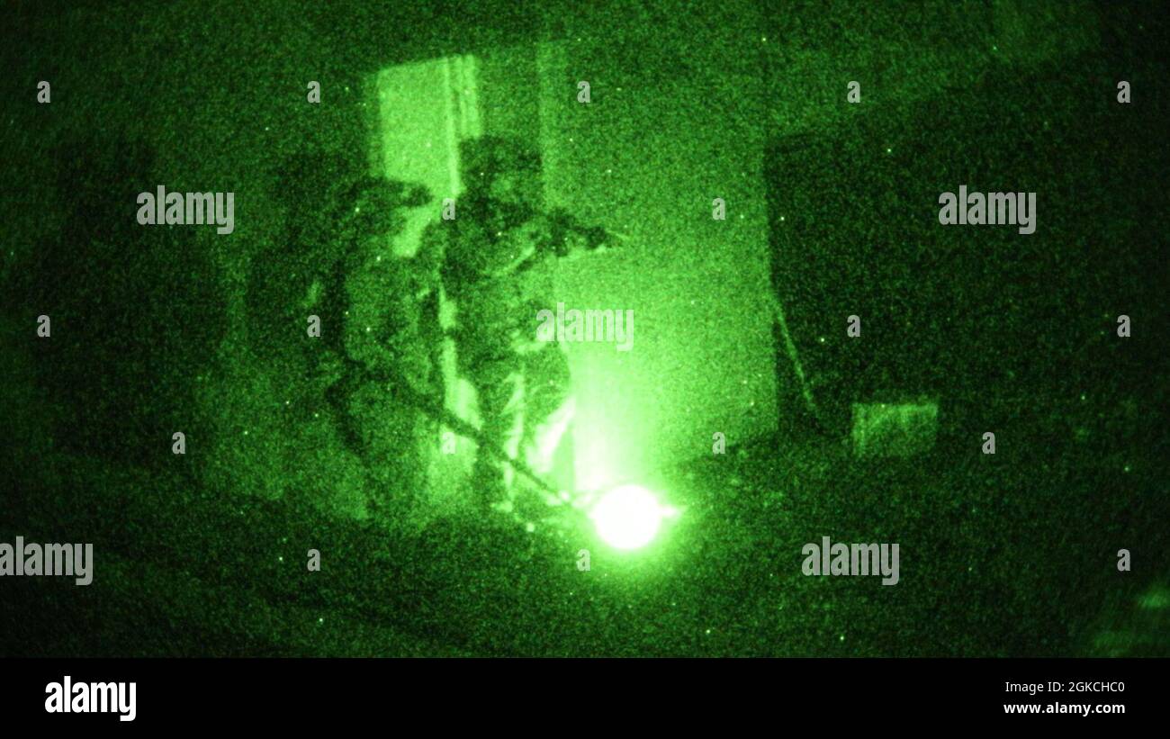 A U.S. Army EOD Technician from 53rd Ordnance Company (EOD) clears a ...