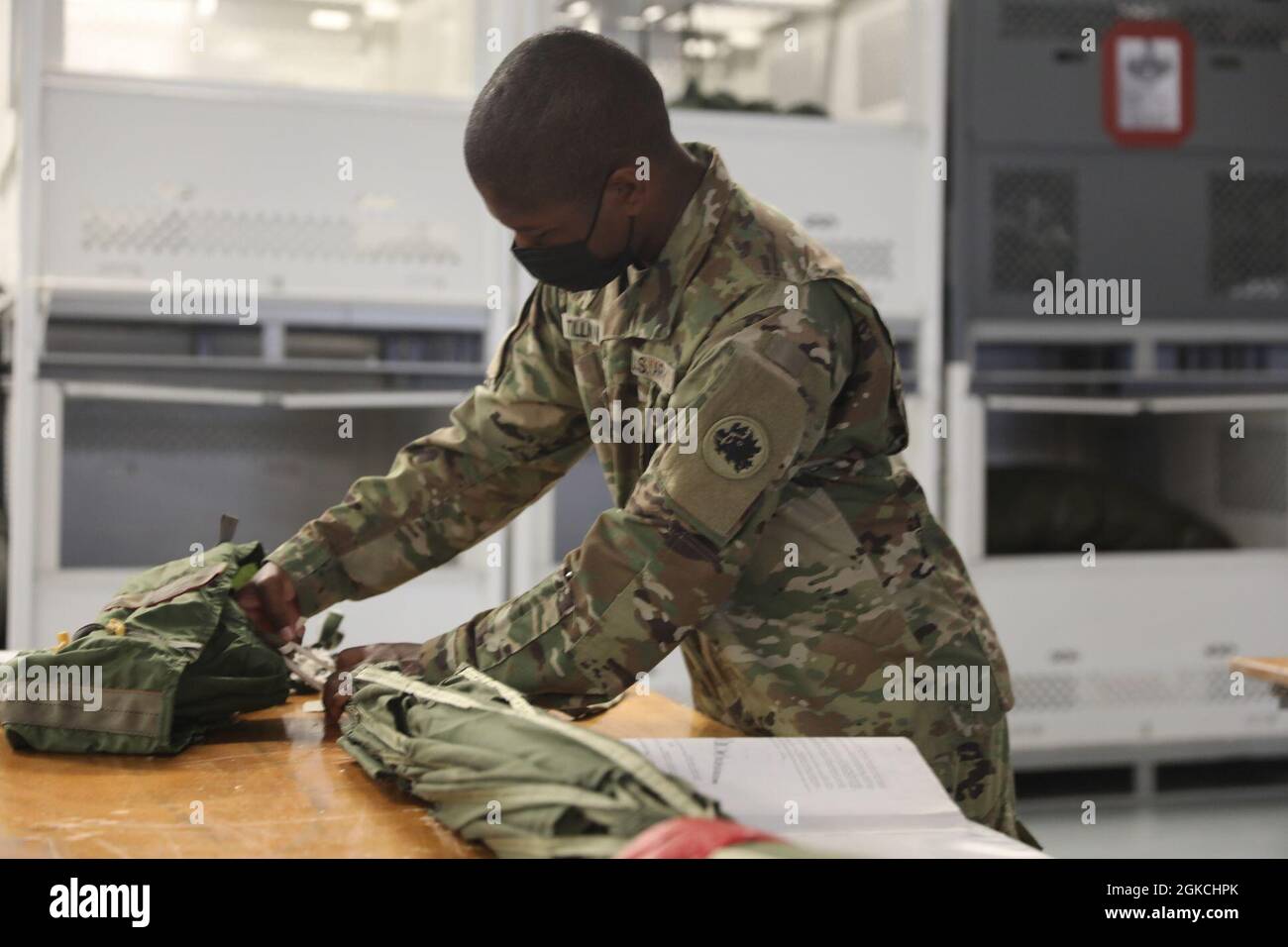 U.S. Army Cpl. Rasheed Tillman, a parachute rigger with the Georgia ...