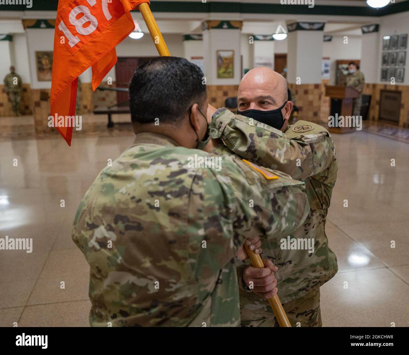U.S. Army Master Sgt. Israel Mahadeo, the commander of troops, passes ...