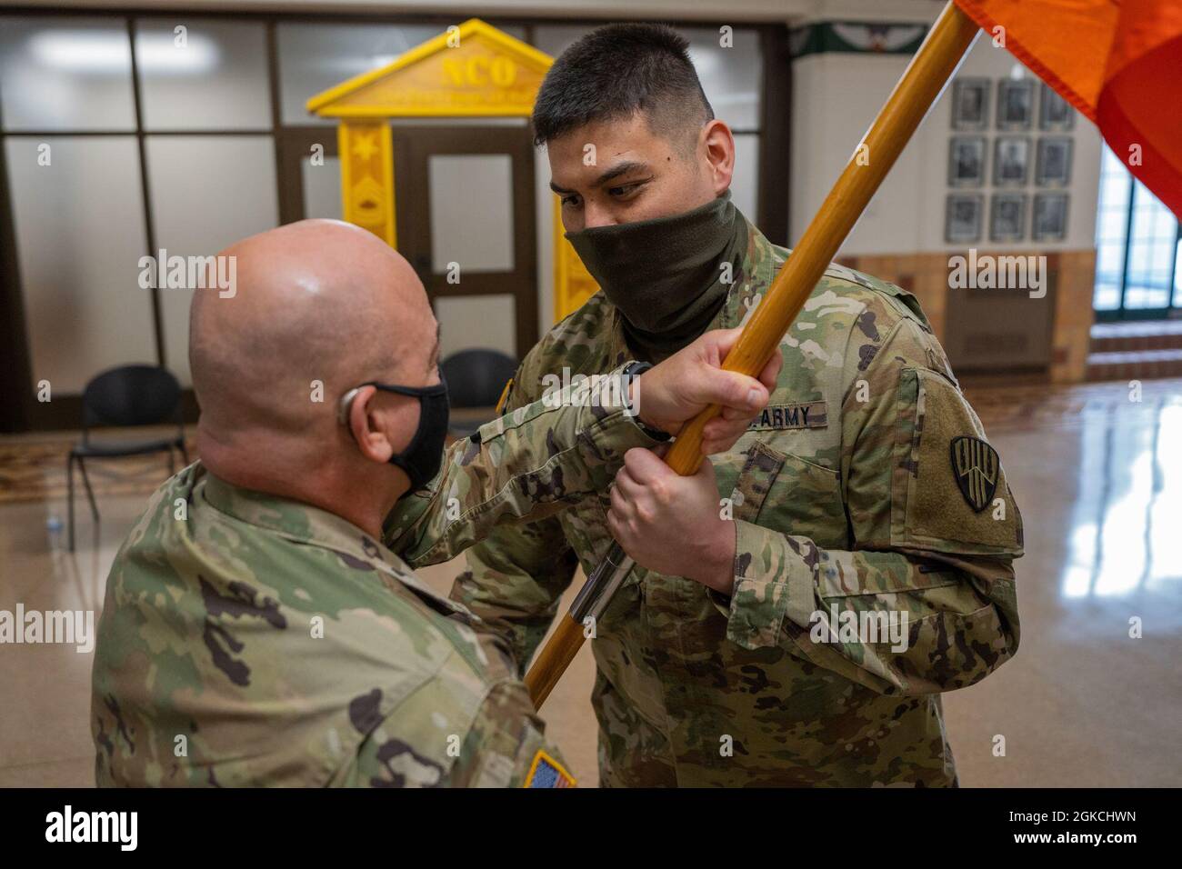 U.S. Army 1st Sgt. Ruben Delgado, the outgoing first sergeant, passes ...