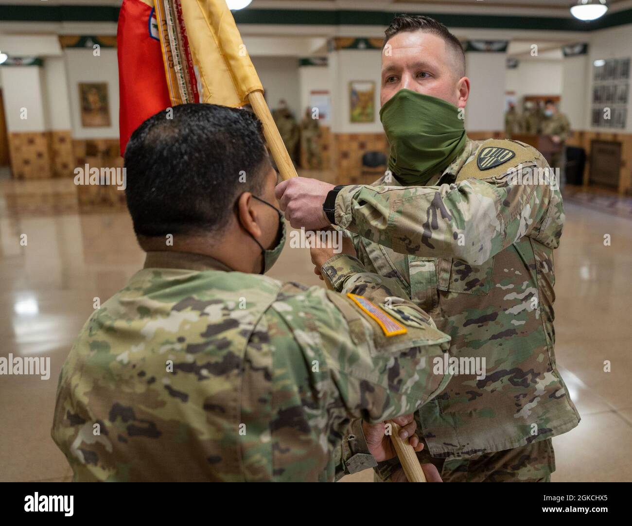 U.S. Army Master Sgt. Israel Mahadeo, the commander of troops, passes ...
