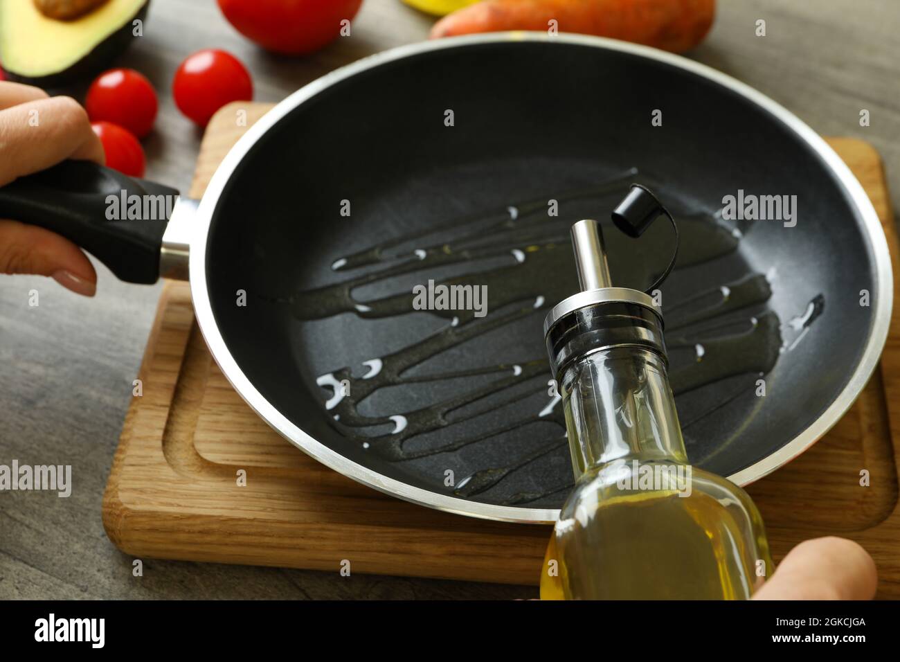 Concept of cooking with oil, close up Stock Photo - Alamy