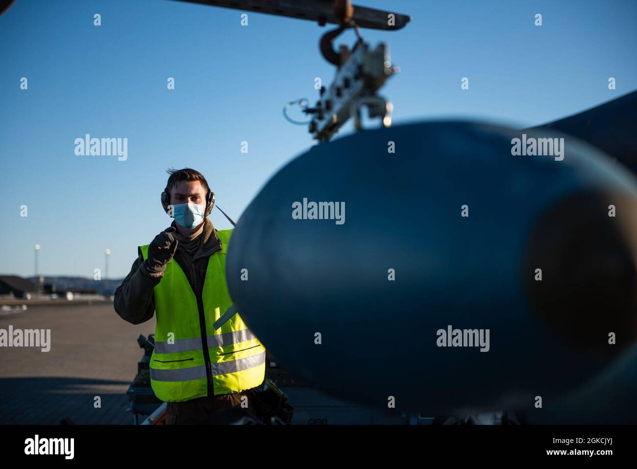 A weapons load crew team chief assigned to the 9th Expeditionary Bomb ...