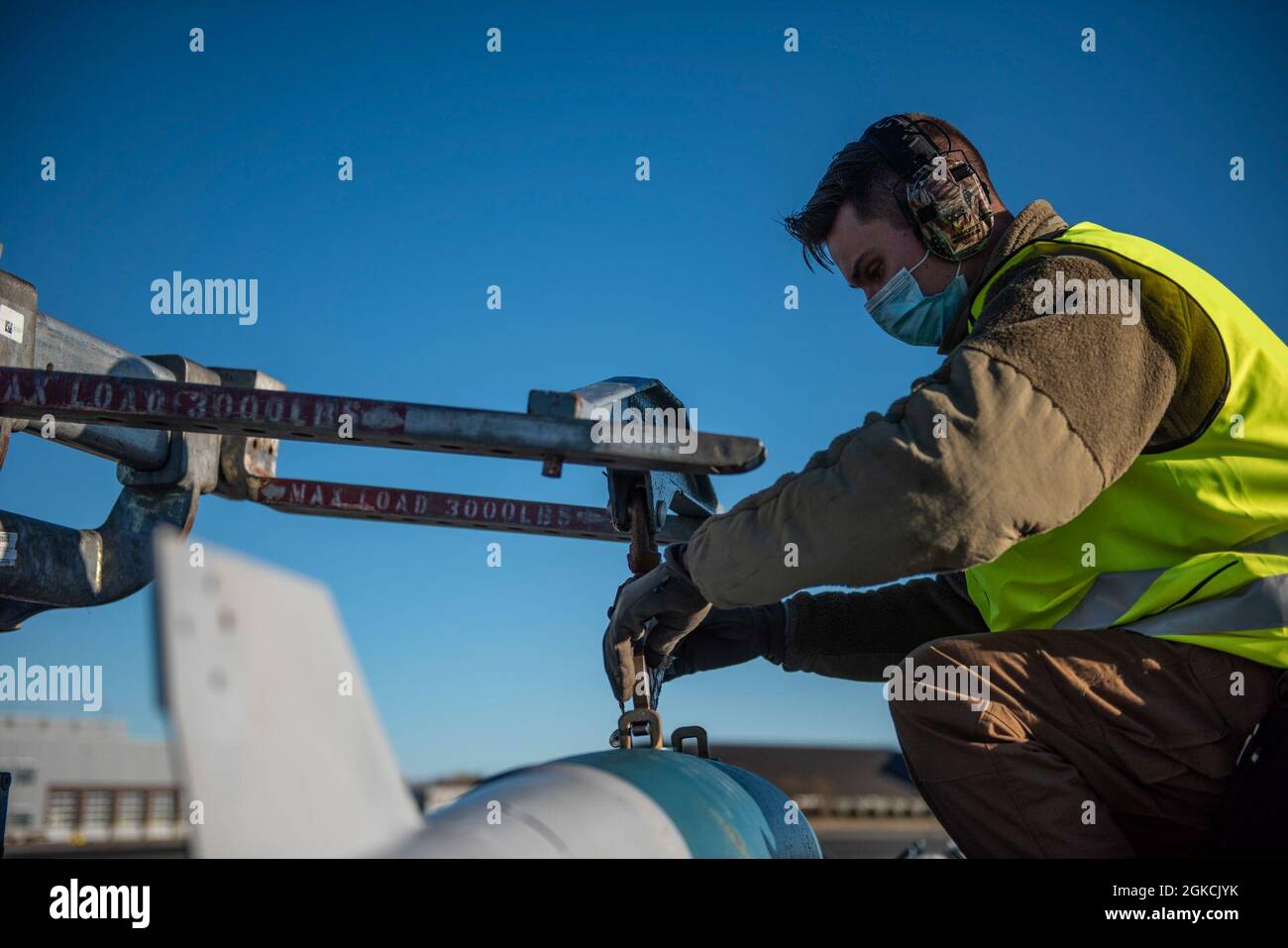 A weapons load crew team chief assigned to the 9th Expeditionary Bomb ...
