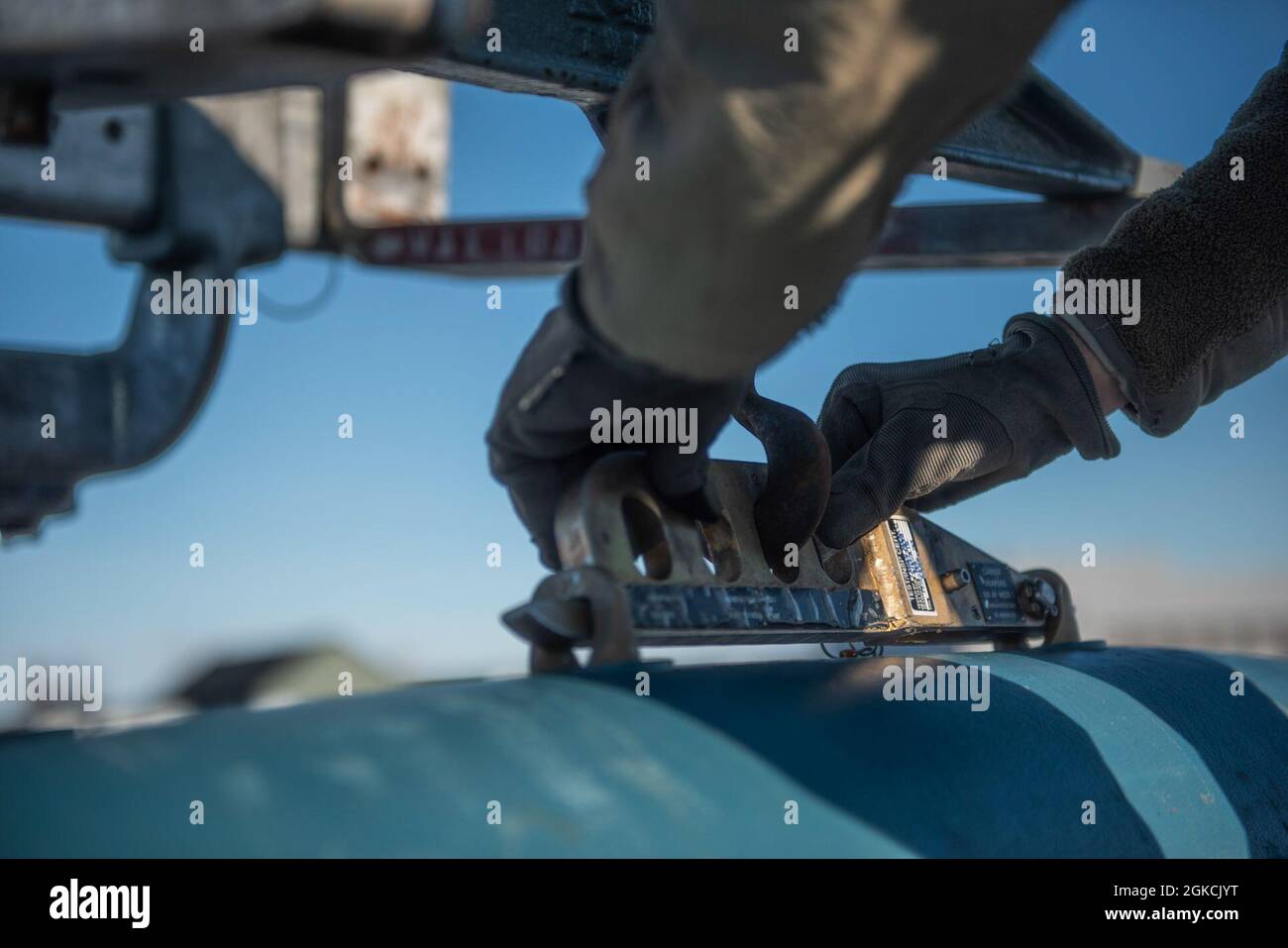 A weapons load crew team chief assigned to the 9th Expeditionary Bomb ...