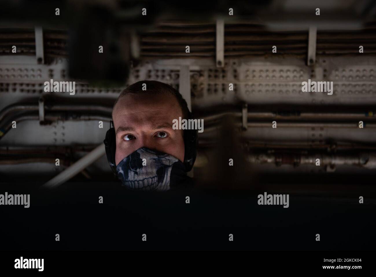 A weapons load crew member assigned to the 9th Expeditionary Bomb ...