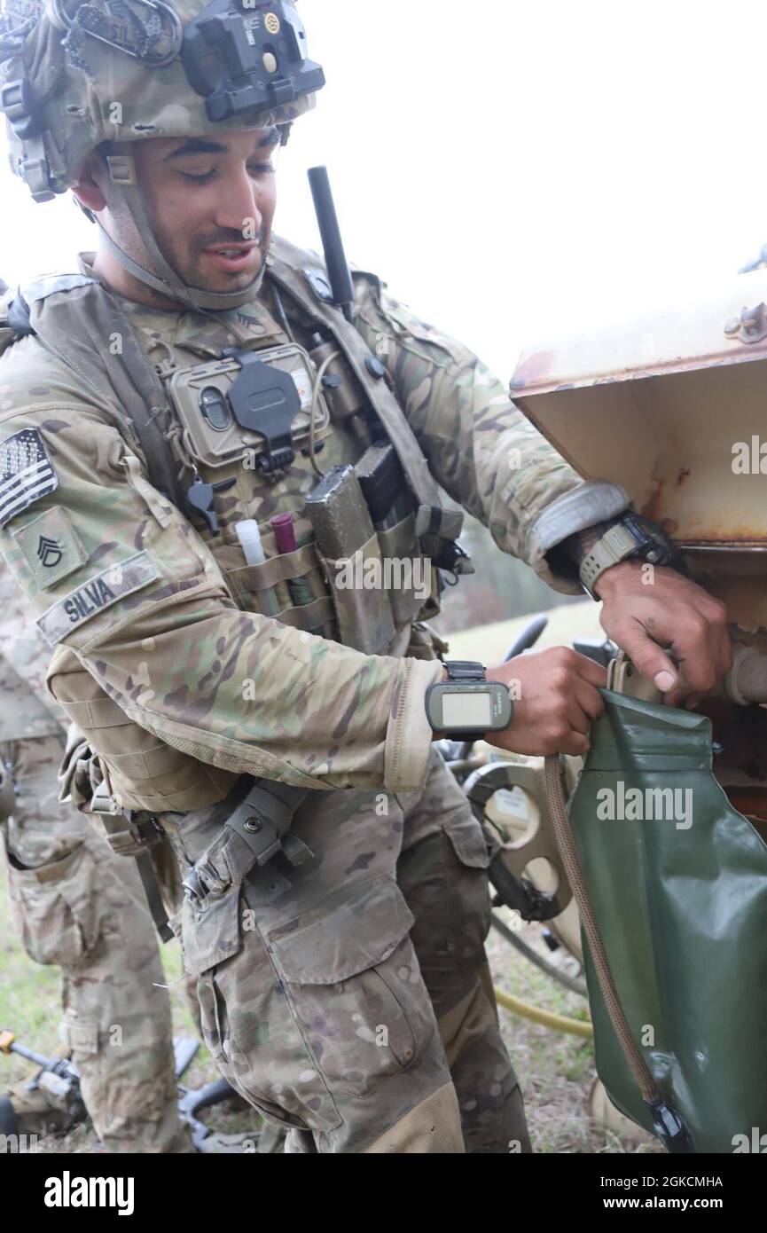 1st Brigade Combat Team 82nd Division Soldier fills camel back with ...