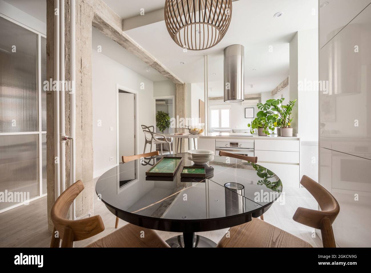 super shiny black office table on the first plate and white cooker with ...