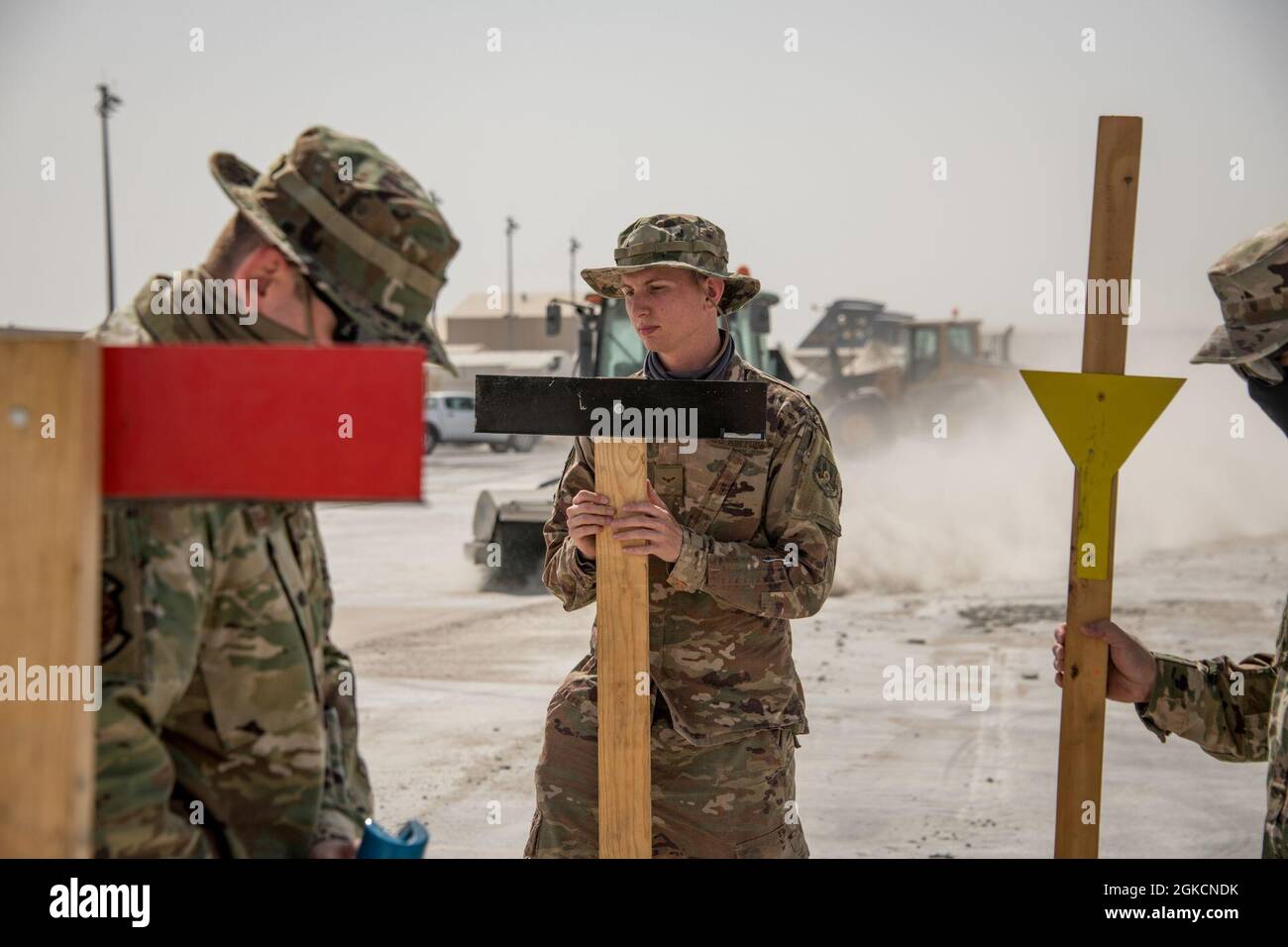 U.S. Airmen assigned to the 379th Expeditionary Civil Engineer Squadron ...
