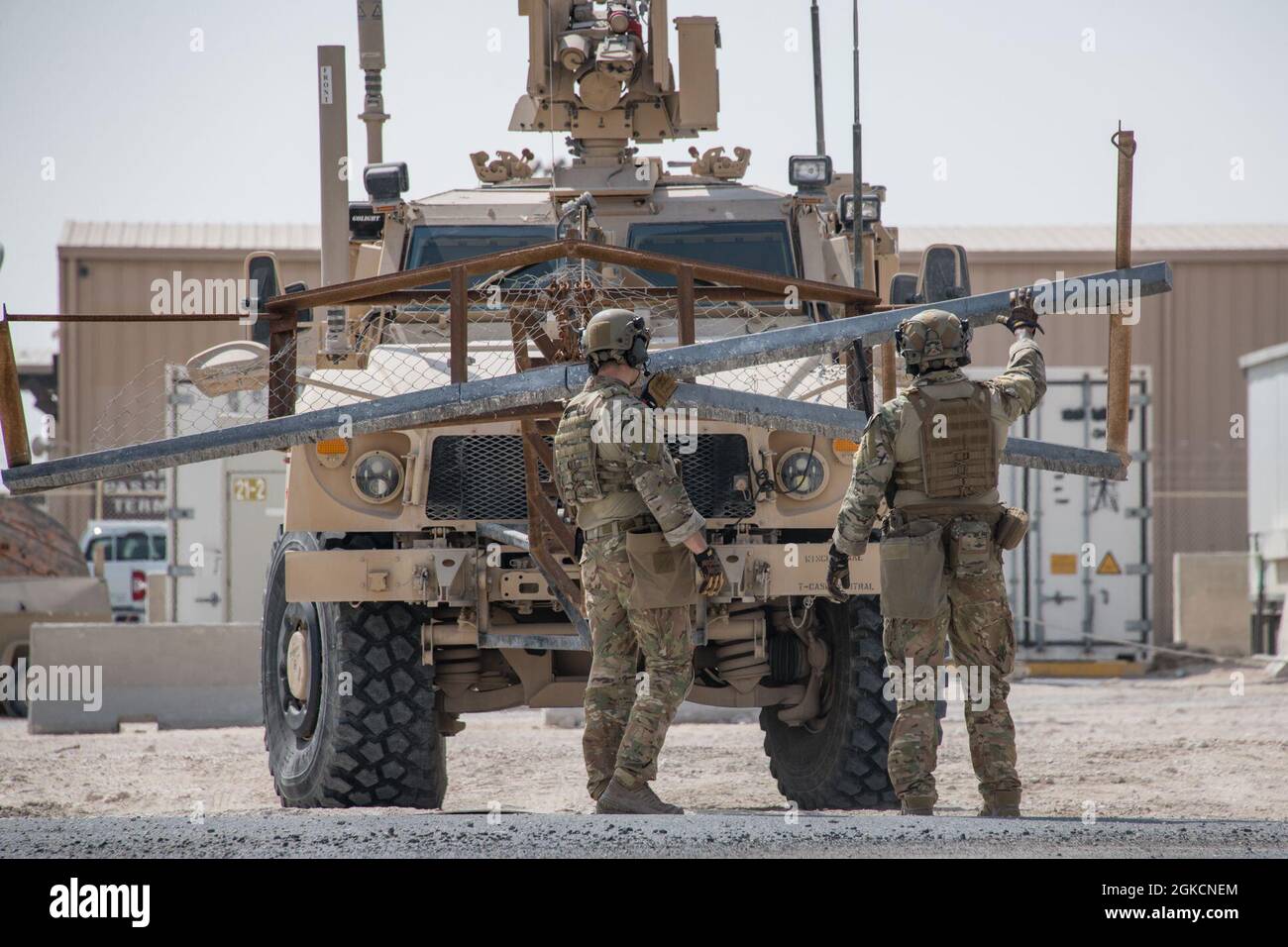 U.S. Airmen assigned to the 379th Expeditionary Civil Engineer Squadron ...