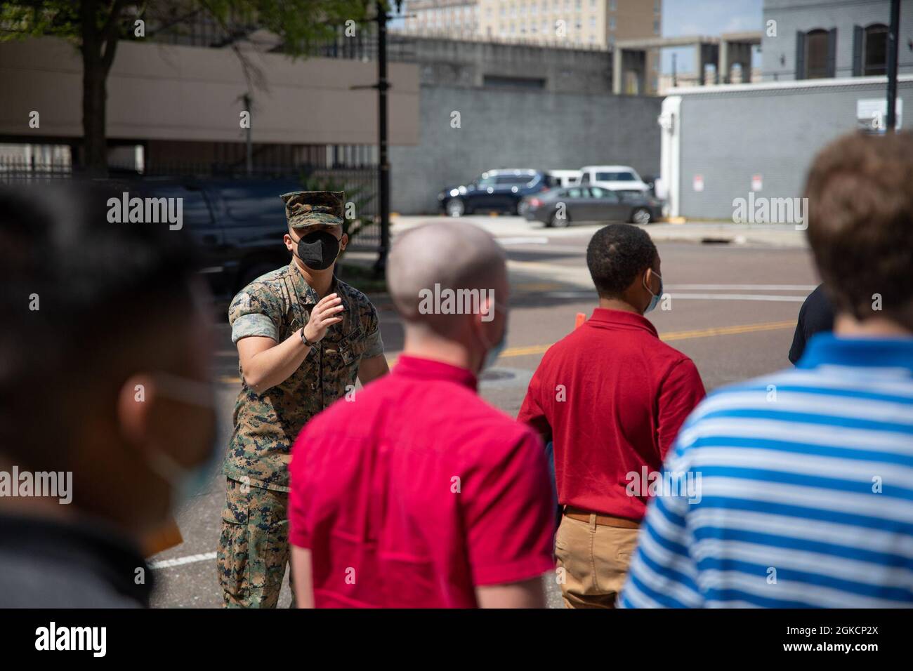A Marine with Task Force Commitment takes accountability of recruits ...