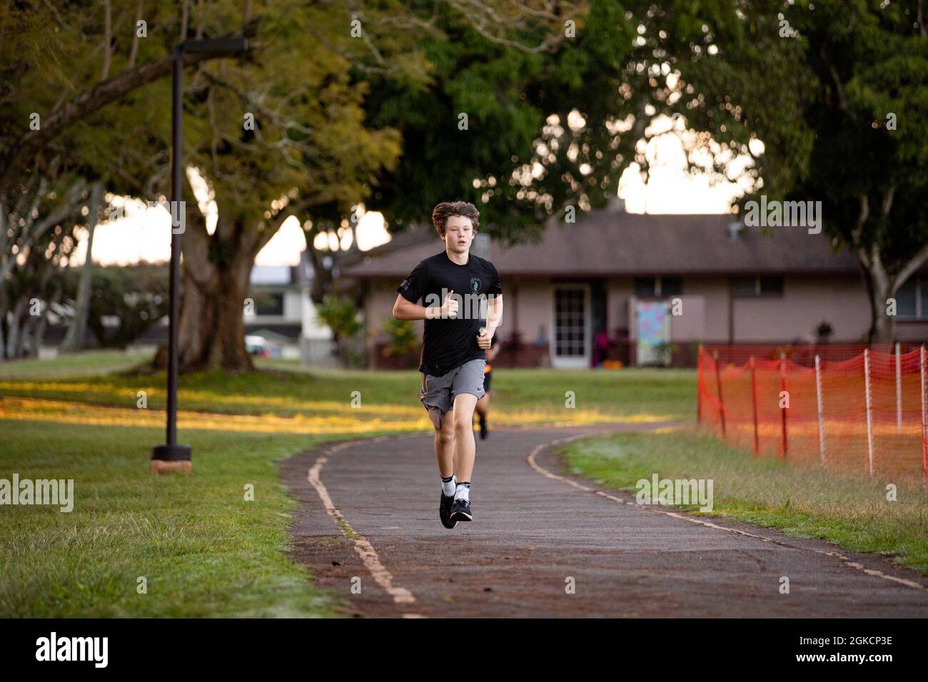 A son of Ed Ray, a Gold Star Family Member, runs around the track at ...