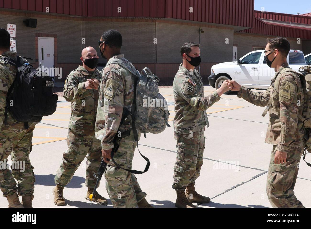 Soldiers from the 2nd Brigade Combat Team, 1st Armored Division are greeted by senior leaders ...