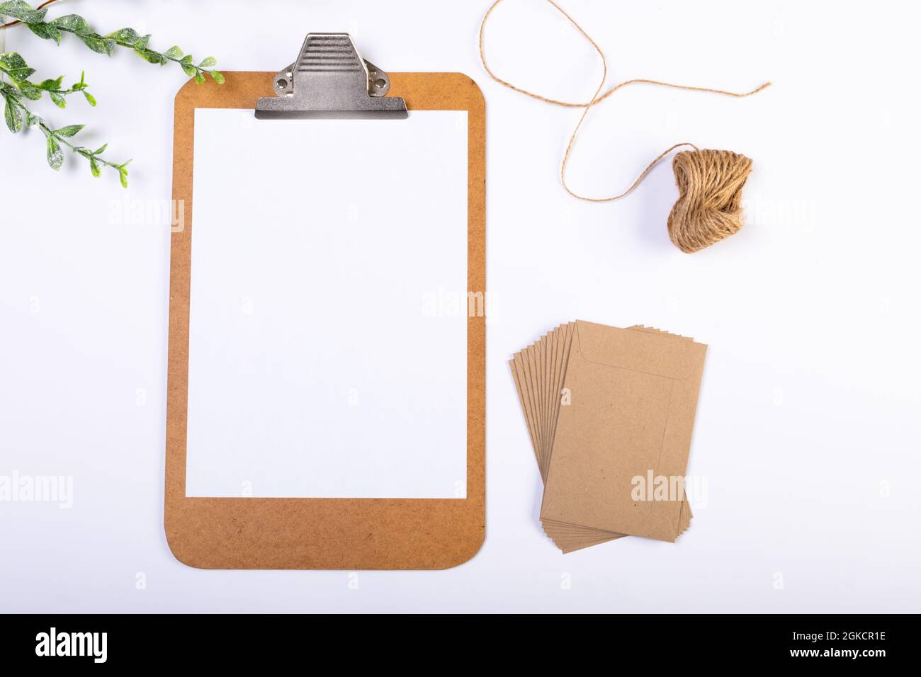 Composition of clipboard with copy space and envelopes, string ...