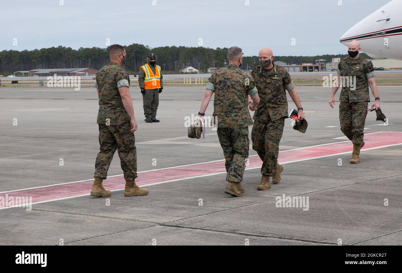 Commandant of the Marine Corps Gen. David H. Berger is greeted with a ...