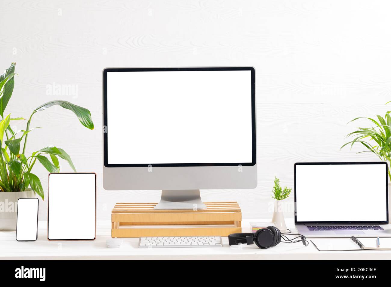 Composition of desktop computer, laptop, tablet and smartphone with ...
