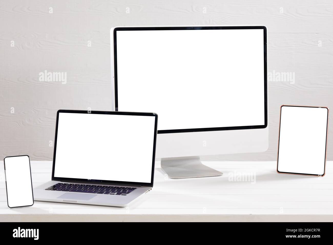 Composition of desktop computer, laptop, tablet and smartphone with ...