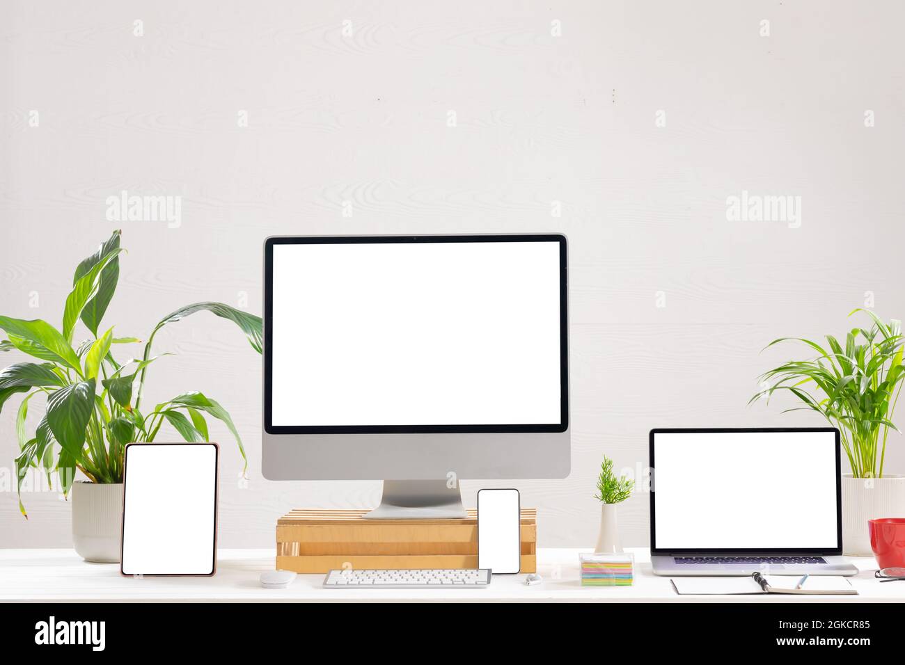 Composition of desktop computer, laptop, tablet and smartphone with ...