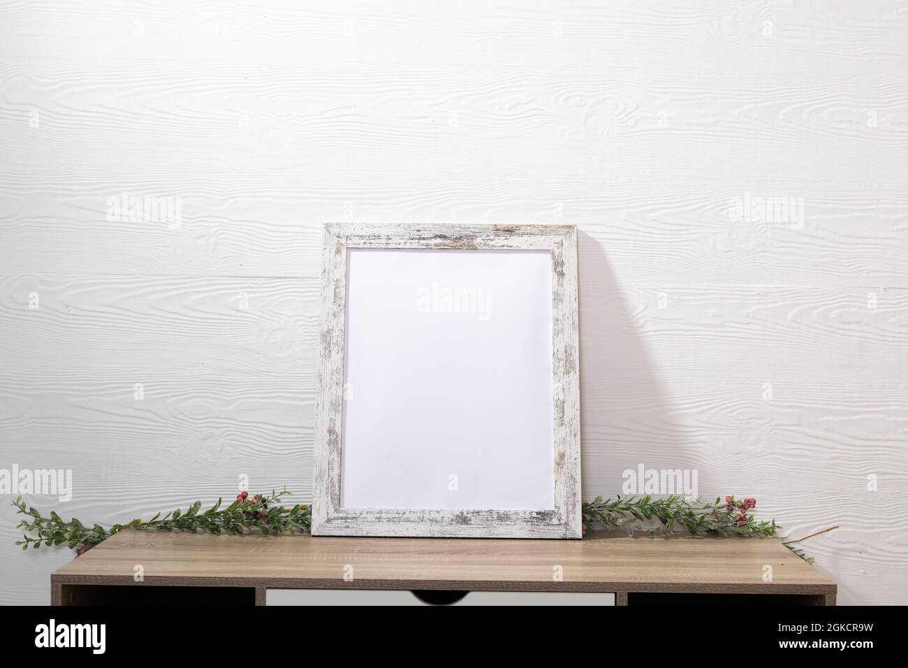 Composition of white card in frame with copy space and decorations on ...